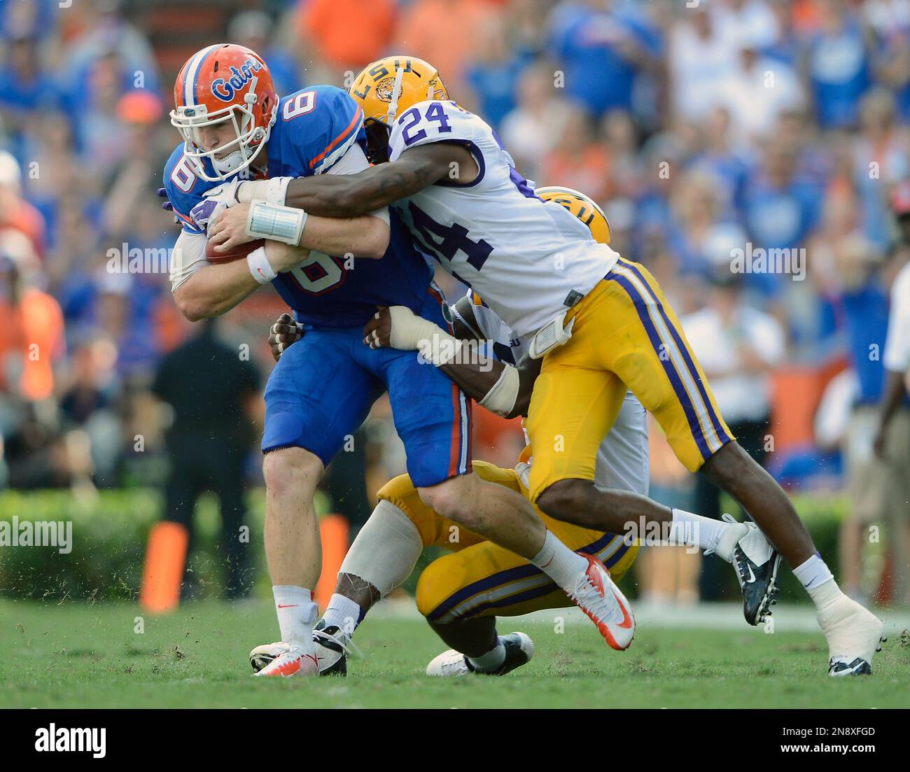 Florida quarterback Jeff Driskel (6) is sacked by LSU cornerback ...