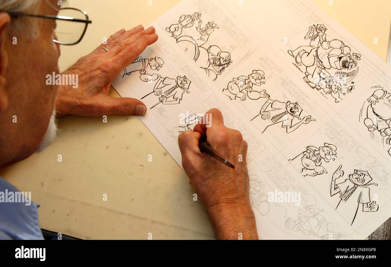 Hy Eisman, 85, works on deadline drawing a Popeye cartoon at his home ...