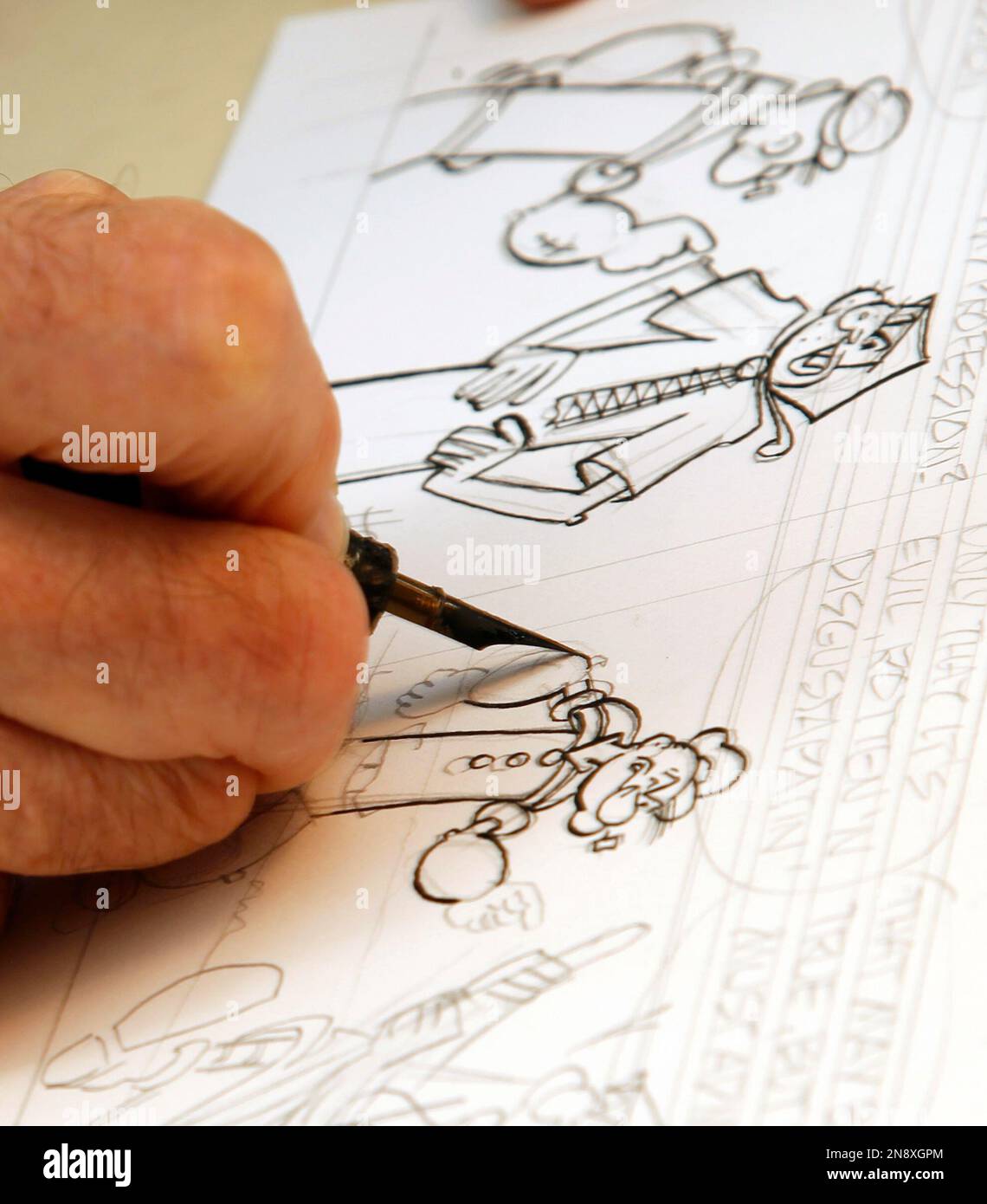 Hy Eisman, 85, works on deadline drawing a Popeye cartoon at his home ...