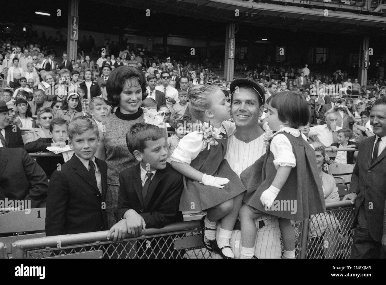 Yankee second baseman Bobby Richardson and his daughter Jeanne, 2, pose ...