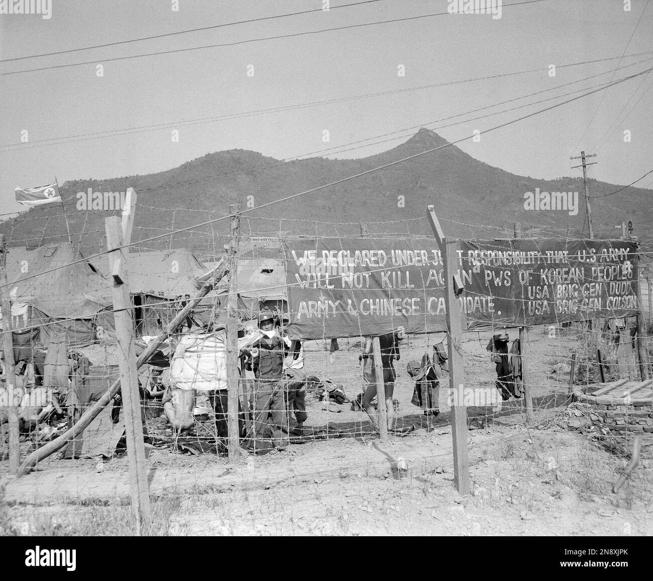 This sign, painted by Communist prisoners of war, greeted ...