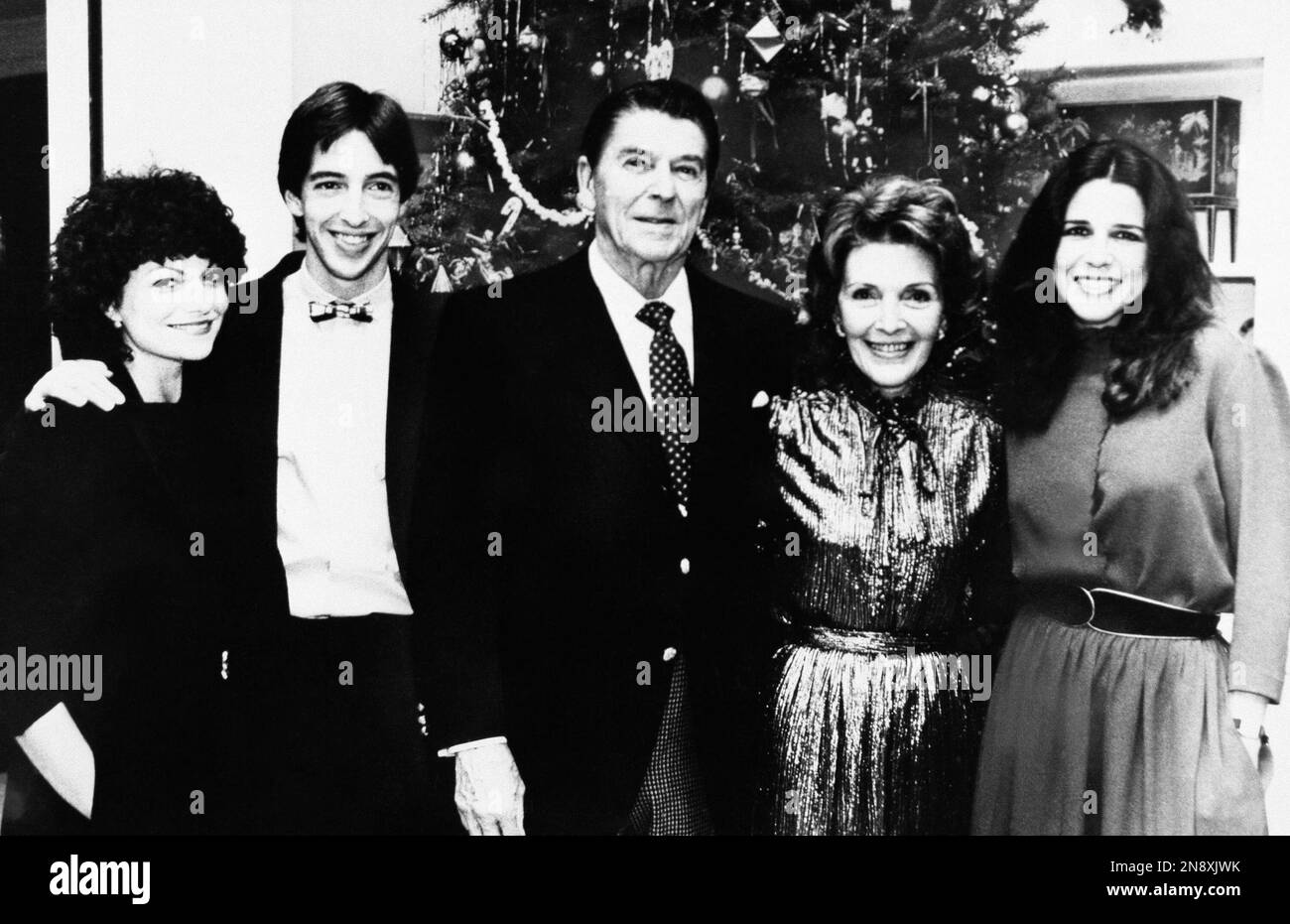President Ronald Reagan and Mrs. Reagan pose under the White House ...
