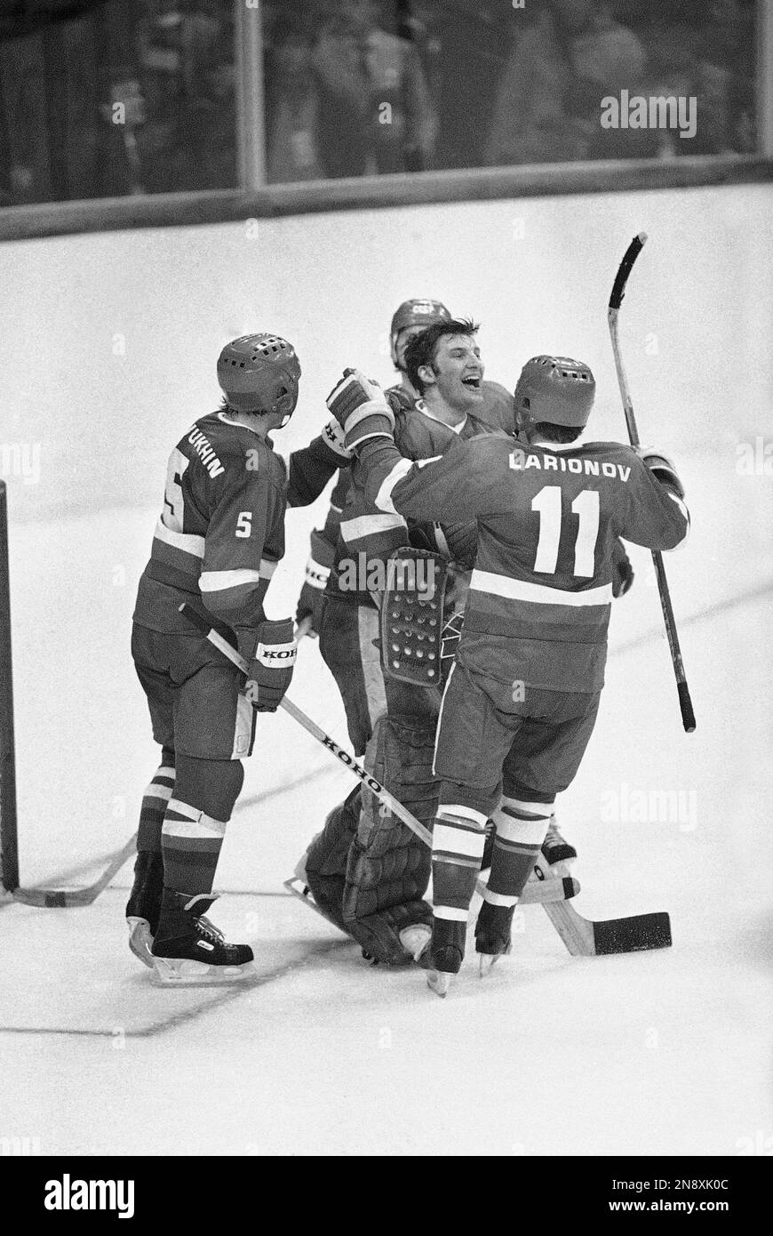 Soviet ice hockey players heap congratulations on their teammate goalie ...