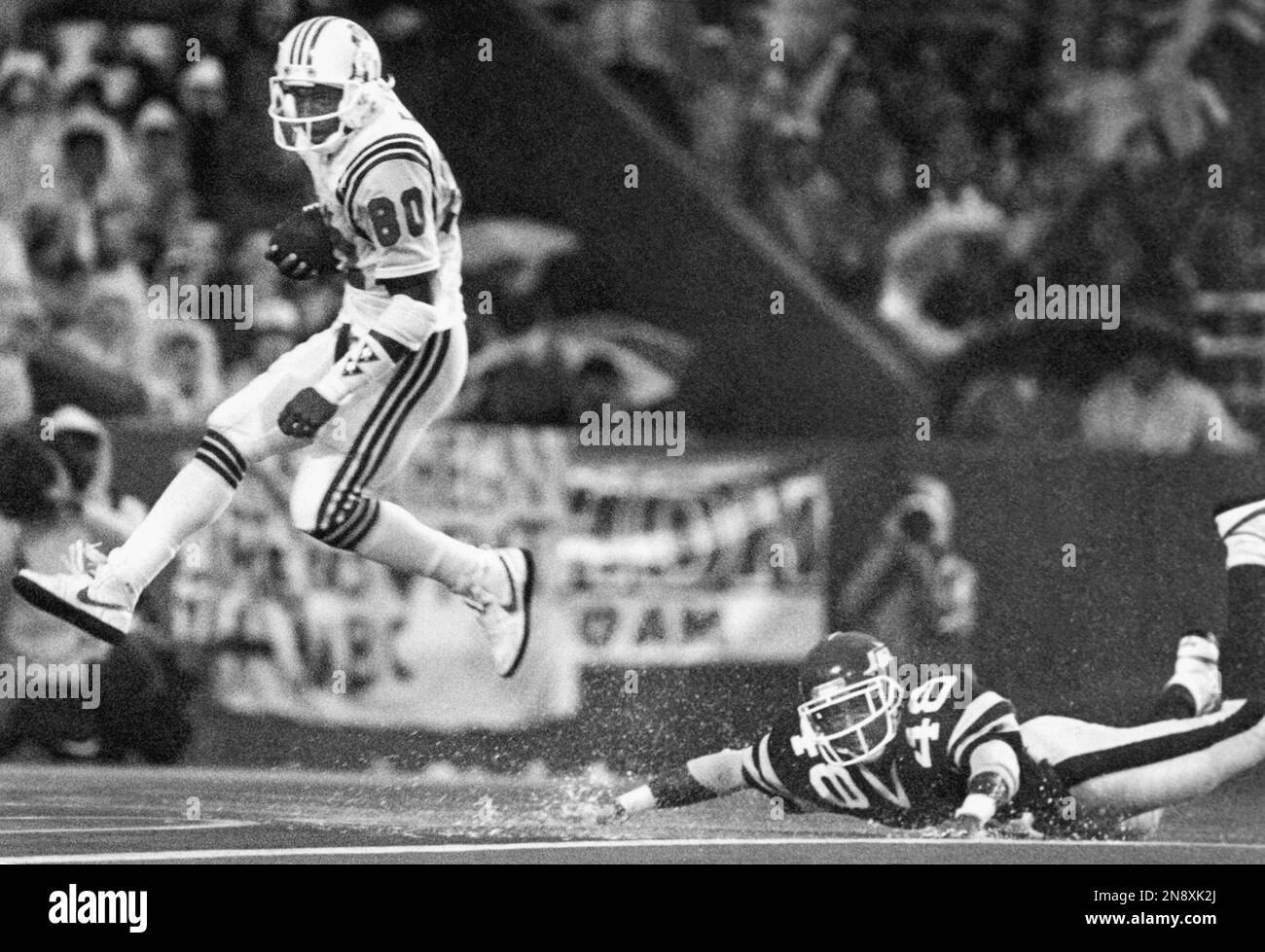 New England Patriots Irving Fryar leaps in the air following his pass ...