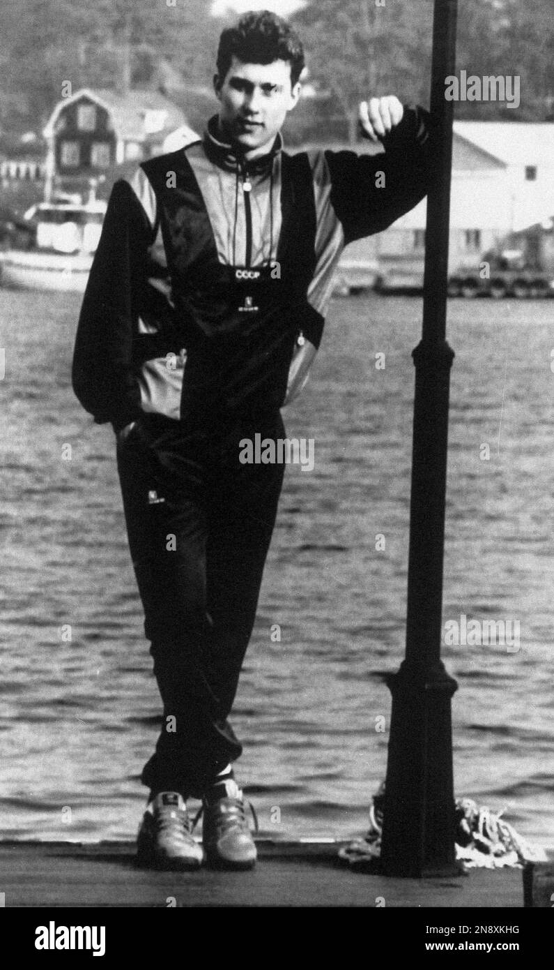 Soviet hockey player Alexander Mogilny leans on a lamp post at Dalaro ...