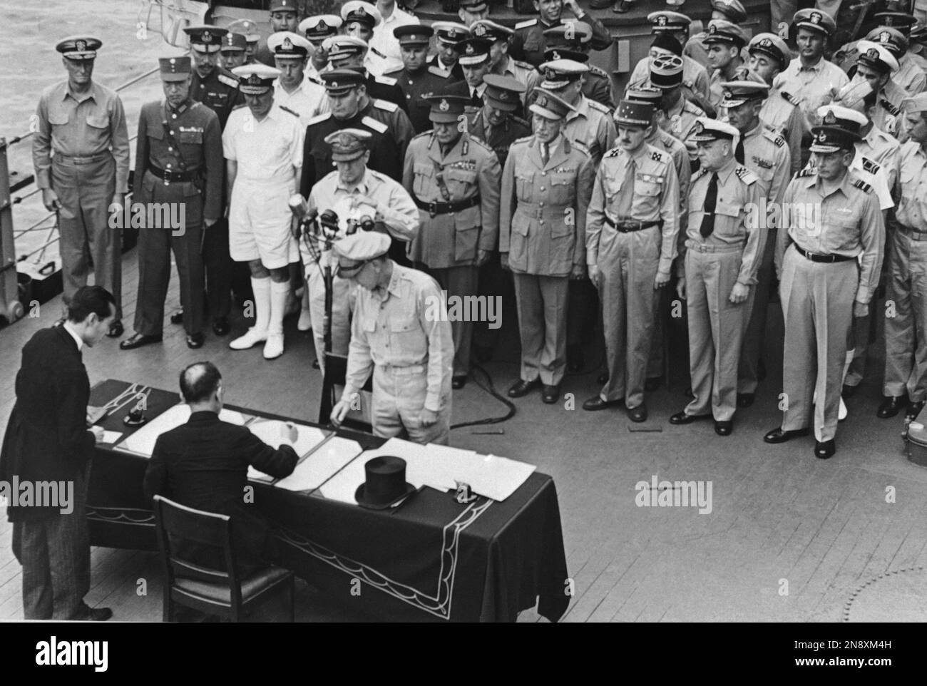 Mamoru Shigemitsu signs the unconditional surrender papers for Emperor ...