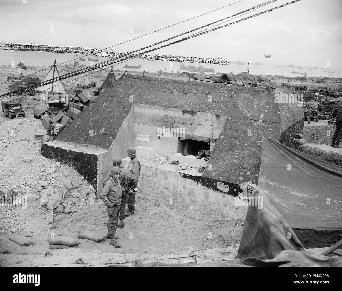 American soldier inspect the rear of a German fortification overlooking ...