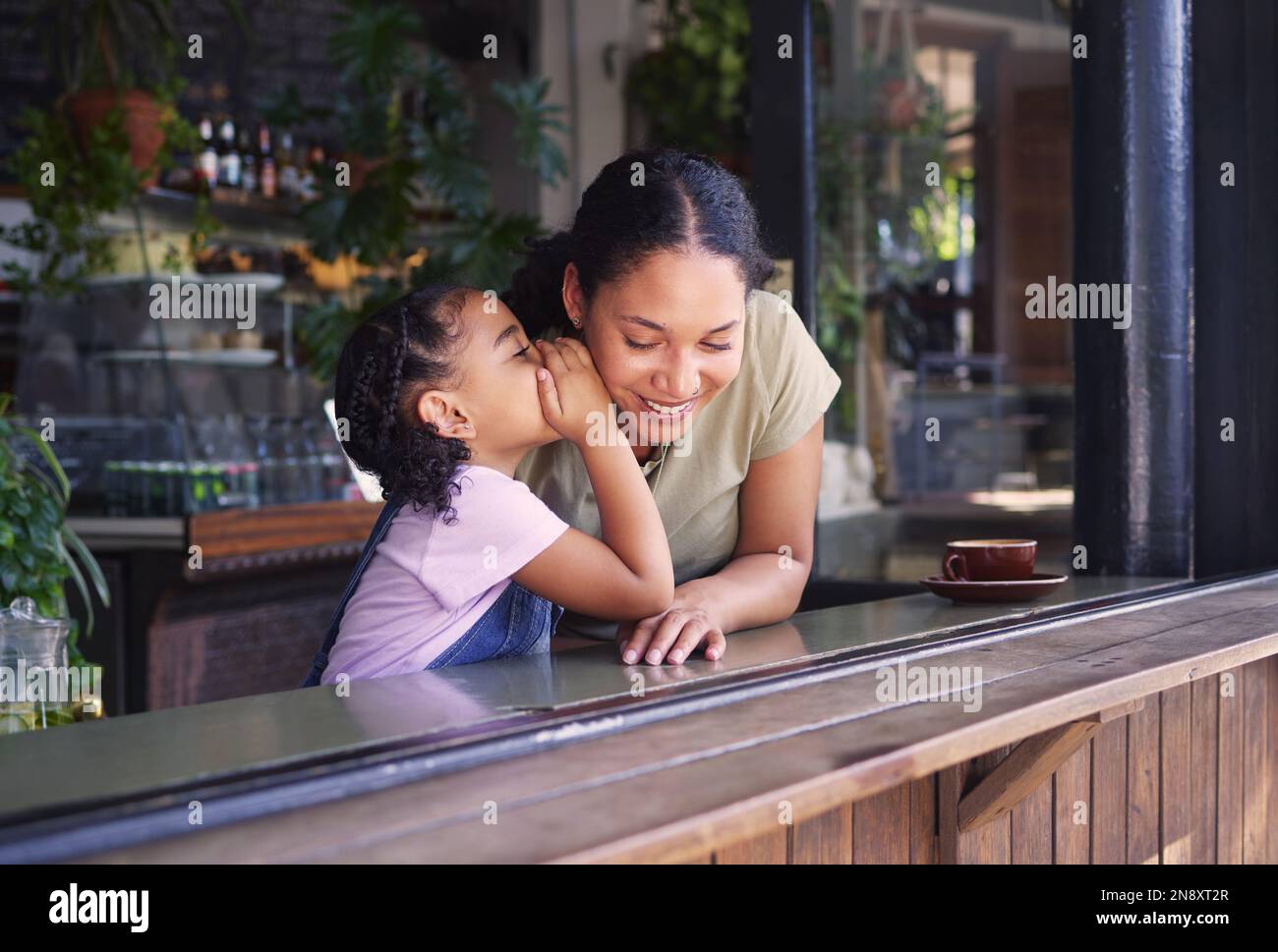 Secret, children and a black family in a coffee shop with a girl ...