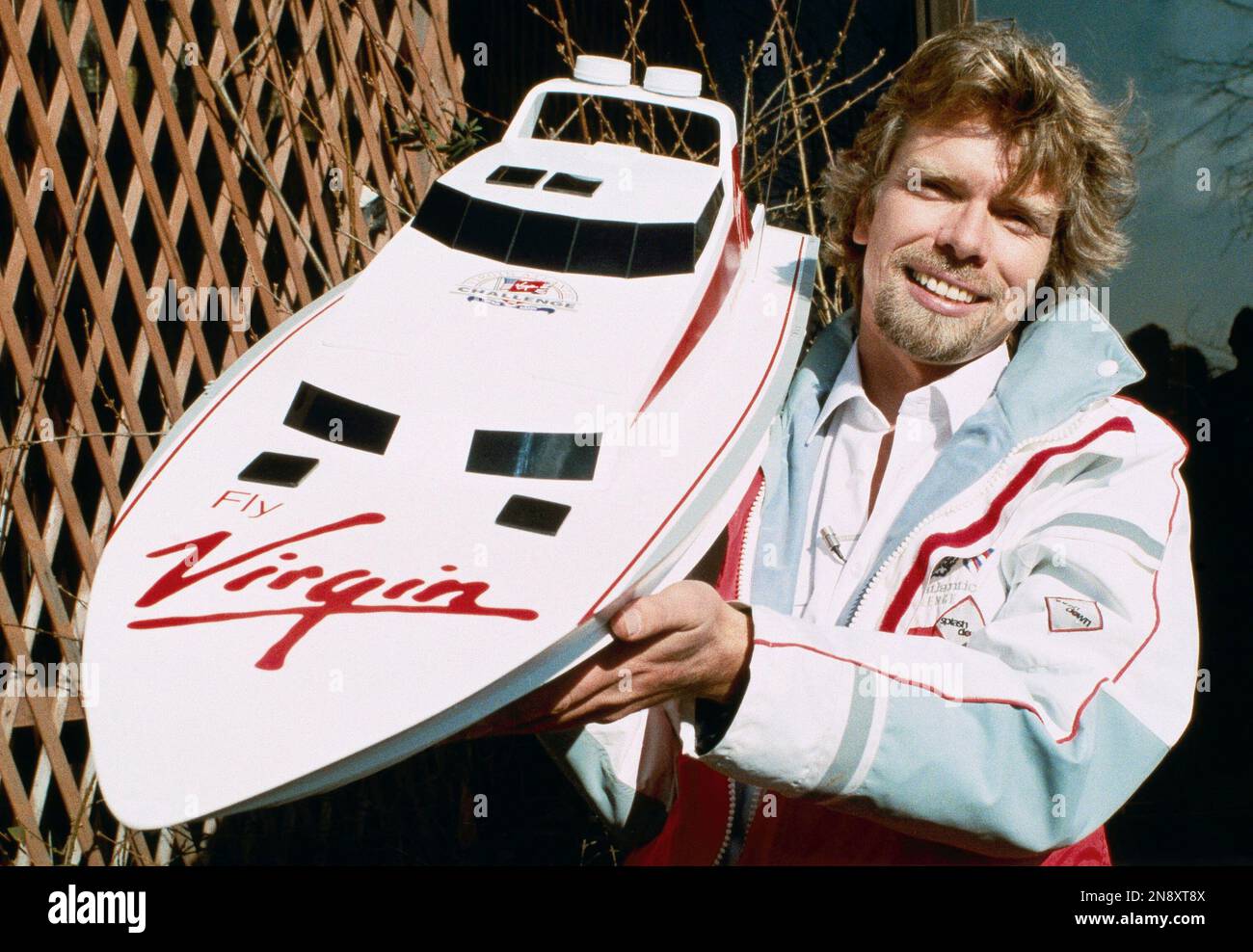 Richard Branson holds a model of his new Virgin Atlantic Challenger II ...