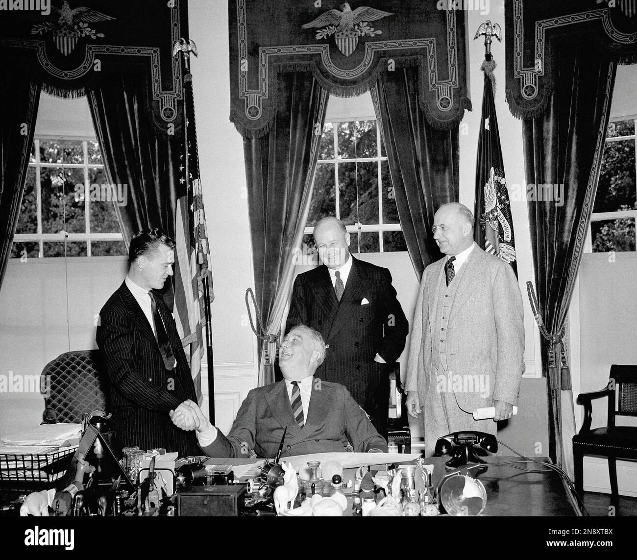 Charles P. Gorry, left, Associated Press photographer, called at the ...