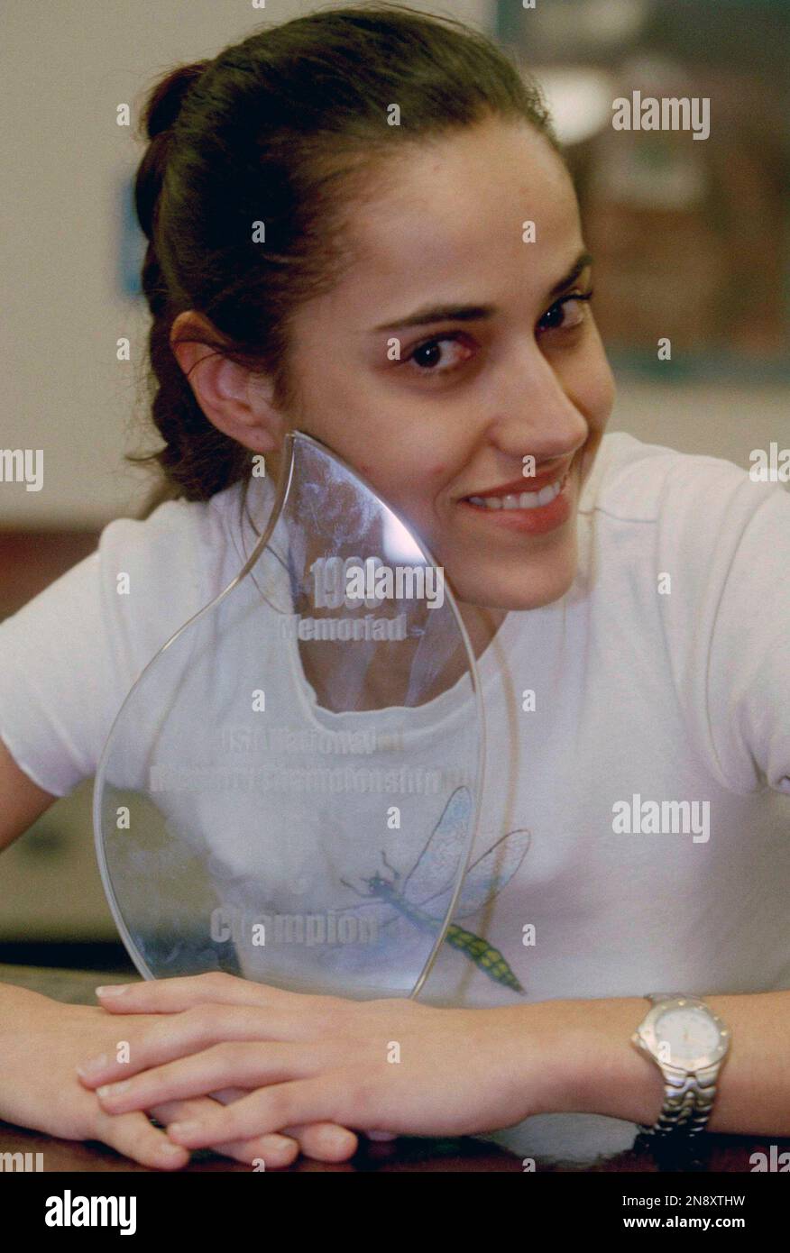 Tatiana Cooley poses with her trophy after winning the 1999 Memoriad, a ...