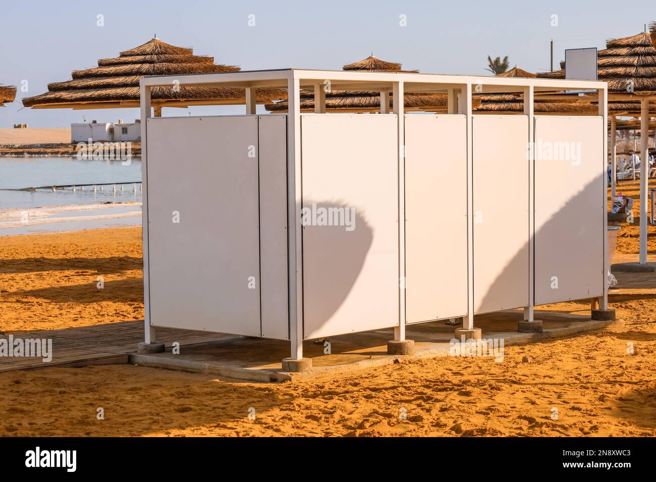 View of changing room on sea beach Stock Photo - Alamy