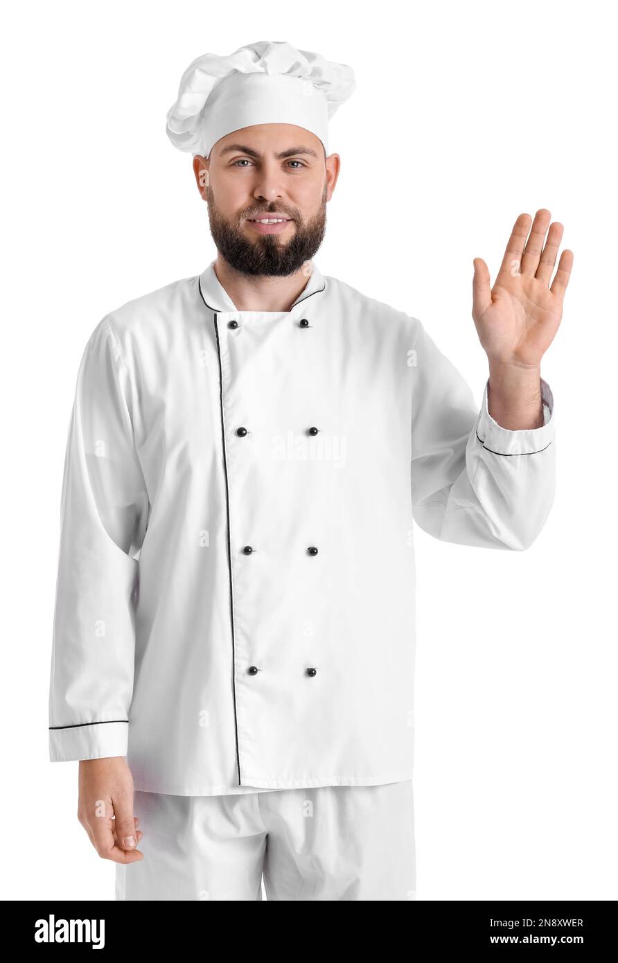 Male baker in uniform waving hand on white background Stock Photo - Alamy