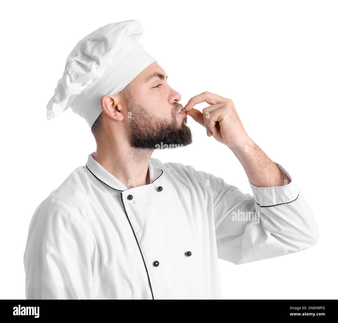 Male baker in uniform on white background Stock Photo - Alamy