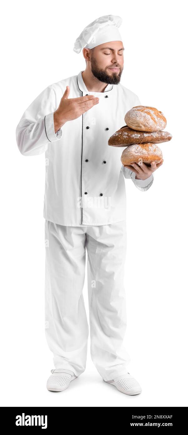 Male baker with loaves of fresh bread on white background Stock Photo ...