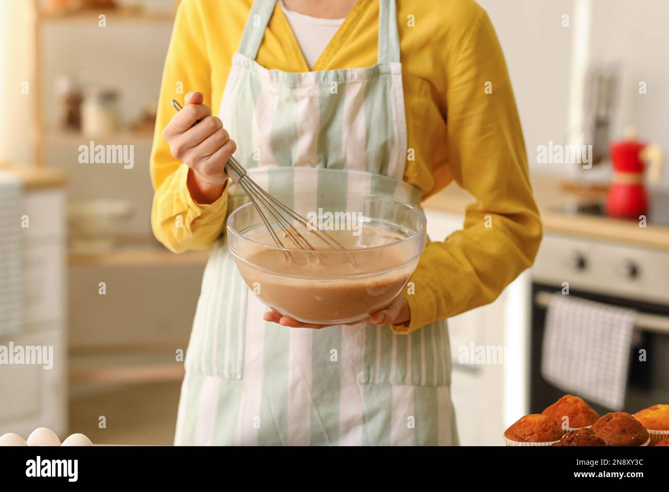 Female baker making dough in kitchen, closeup Stock Photo - Alamy