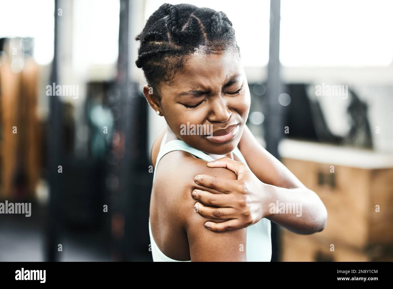 I think Ive torn a muscle in my shoulder. an attractive young woman ...