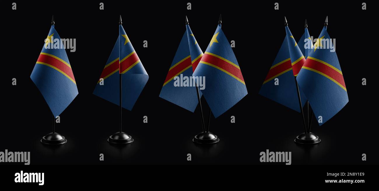 Small national flags of the Democratic Republic of the Congo on a black ...