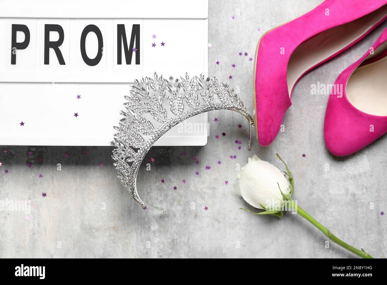 Board with word PROM, tiara, heels and rose on grunge background Stock ...