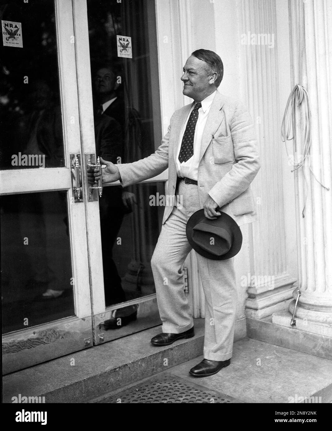 General Hugh S. Johnson, National Recovery Administrator, as he notes ...