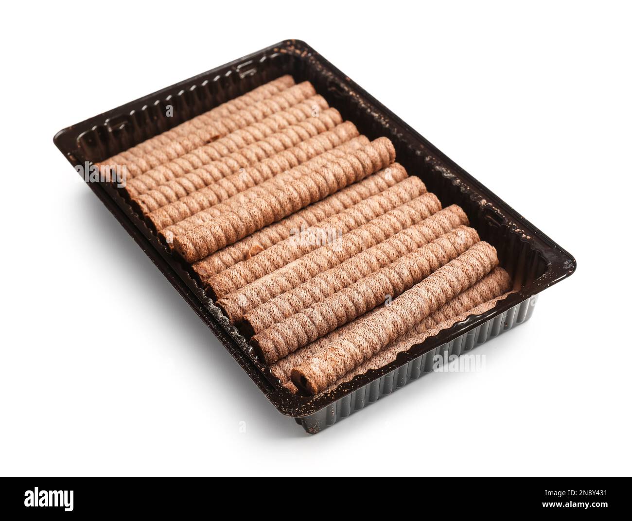Box with delicious chocolate wafer rolls isolated on white background ...