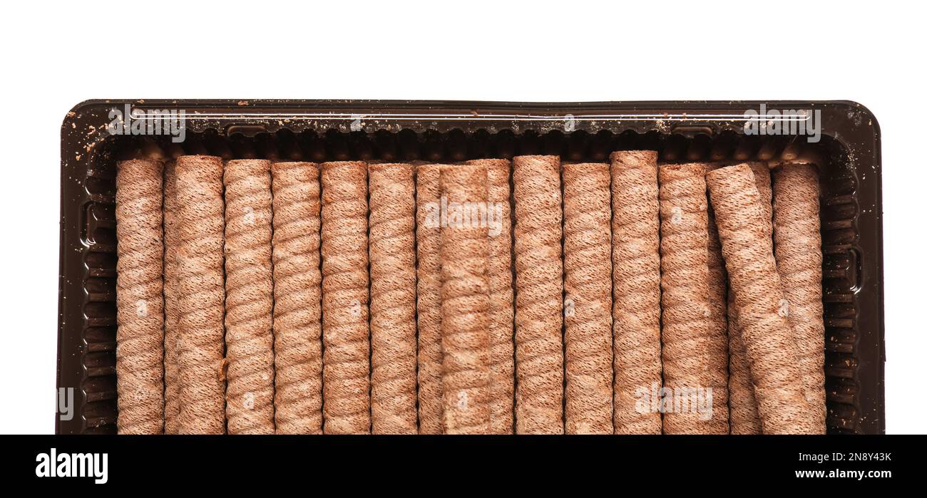 Box with delicious chocolate wafer rolls isolated on white background ...