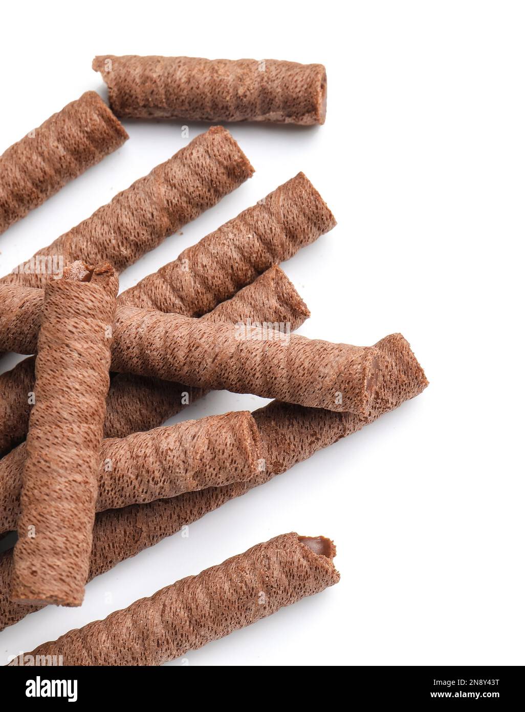 Heap of delicious chocolate wafer rolls isolated on white background ...