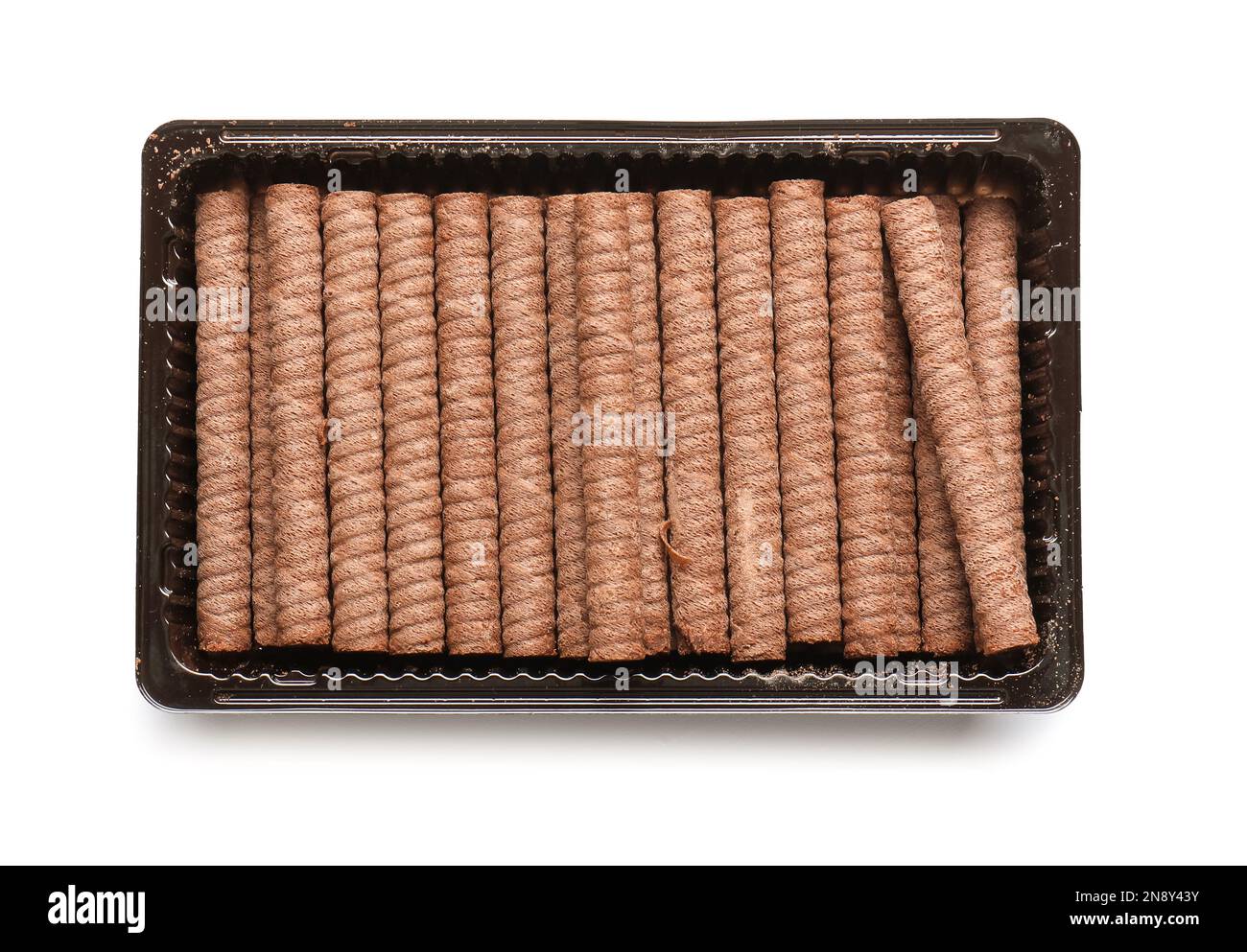 Box with delicious chocolate wafer rolls isolated on white background ...