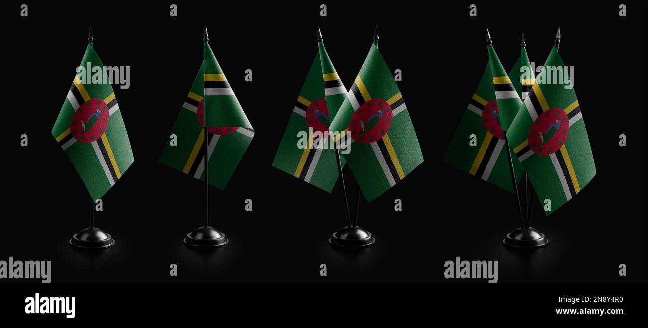 Small national flags of the Dominica on a black background Stock Photo ...