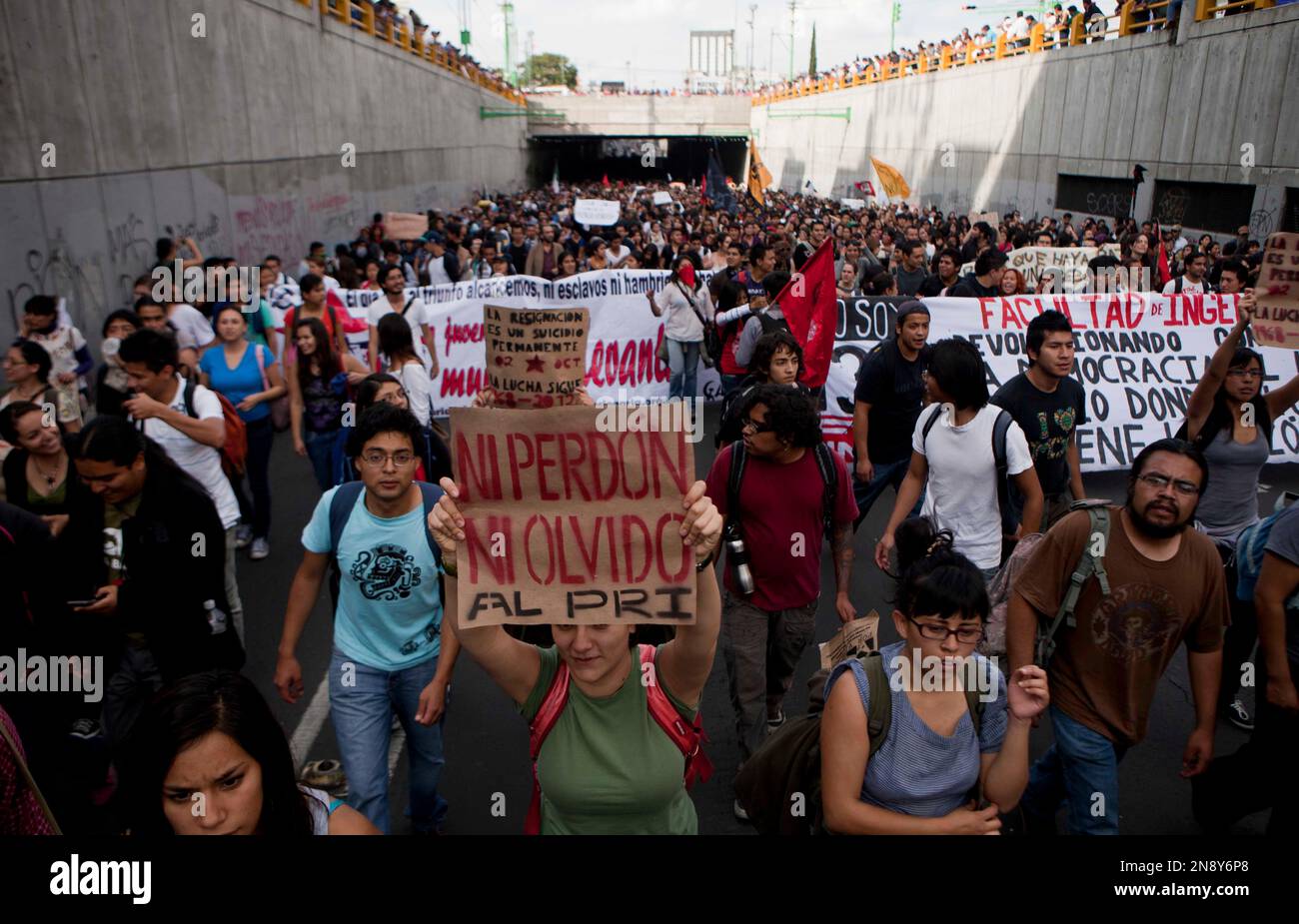 Students demonstrate during a march marking the 44th anniversary of the ...
