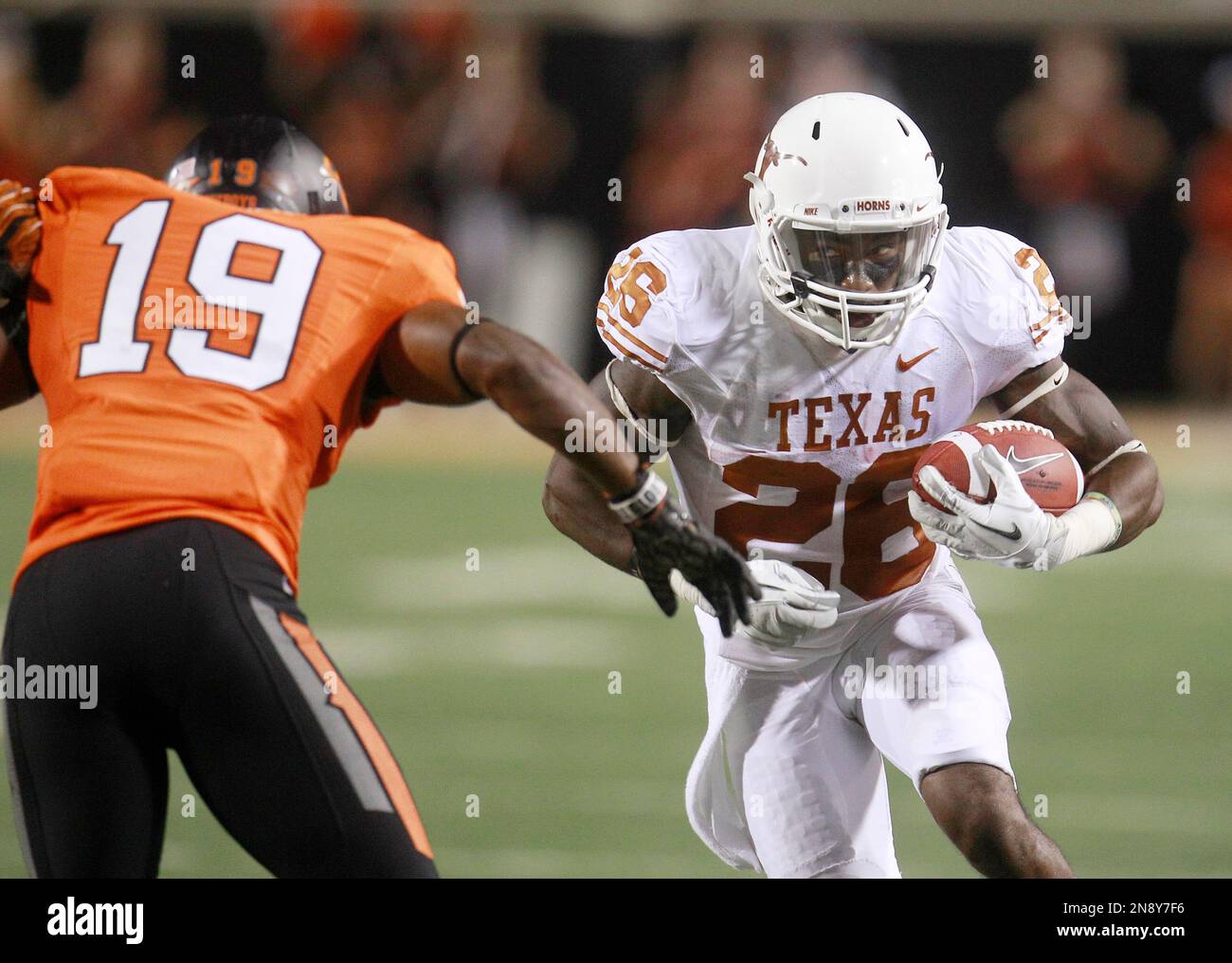 Texas running back D.J. Monroe (26) carries against Oklahoma State ...
