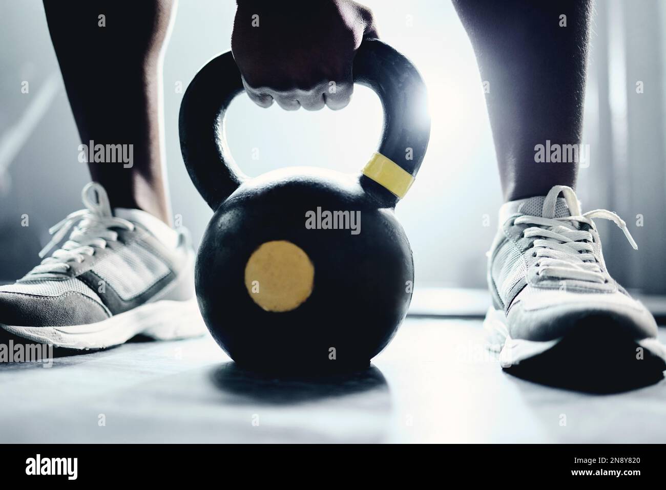 Train the beast within. an unrecognisable woman working out in the gym ...