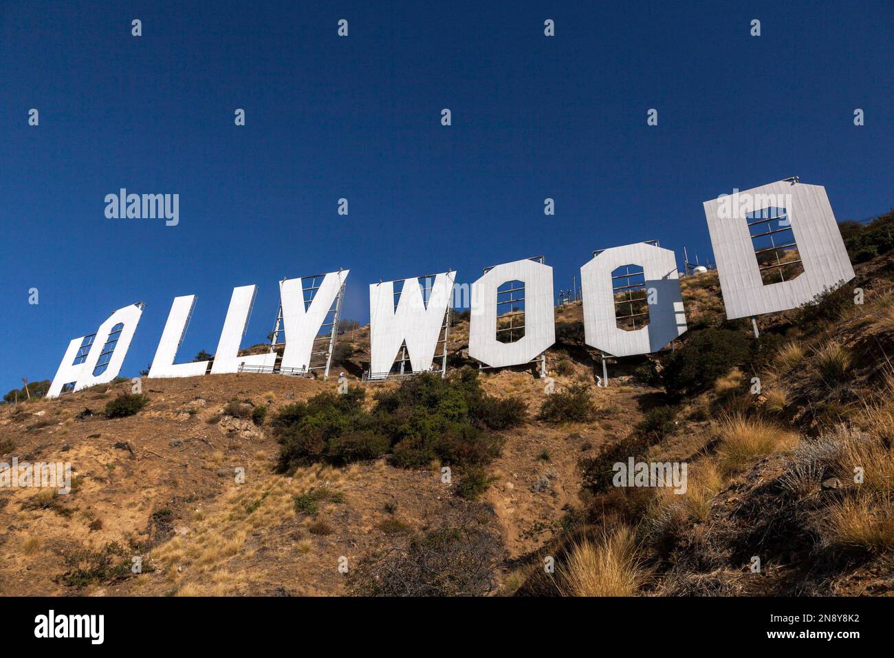 Painting crews set up on the base of the Hollywood Sign in Los Angeles ...