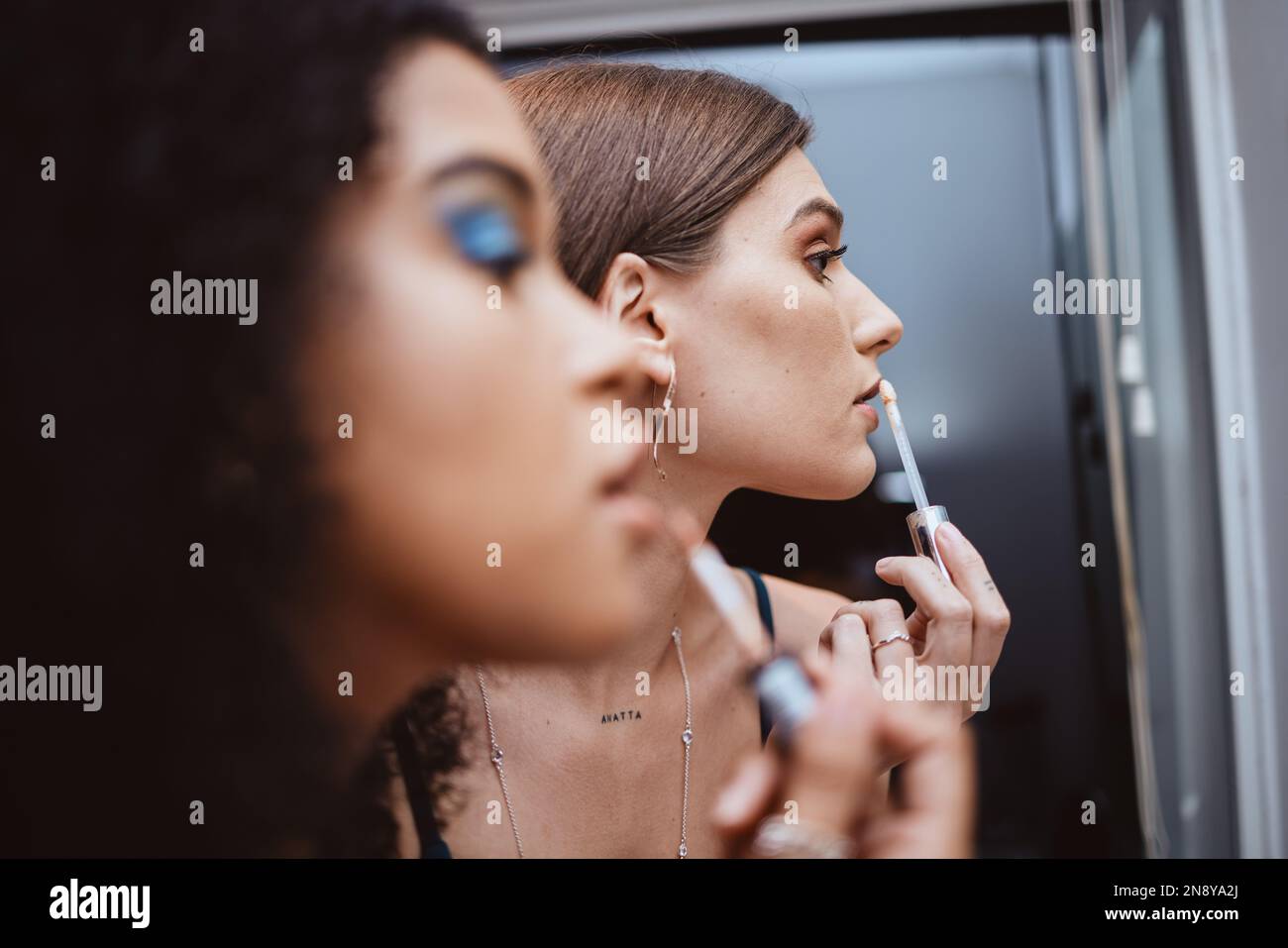 Women, friends and makeup at mirror in bathroom for beauty, diversity ...