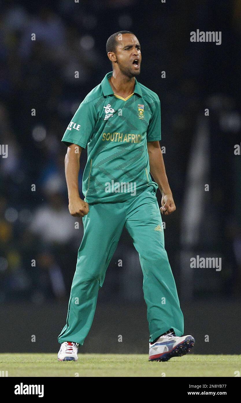 South Africa's bowler Robin Peterson celebrates the dismissal of India ...