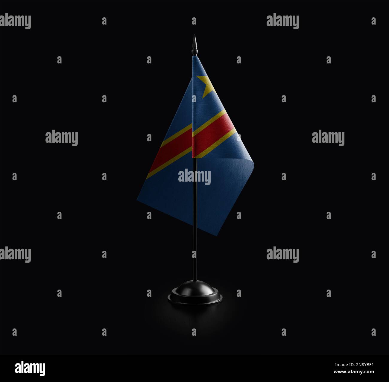Small national flag of the Democratic Republic of the Congo on a black ...