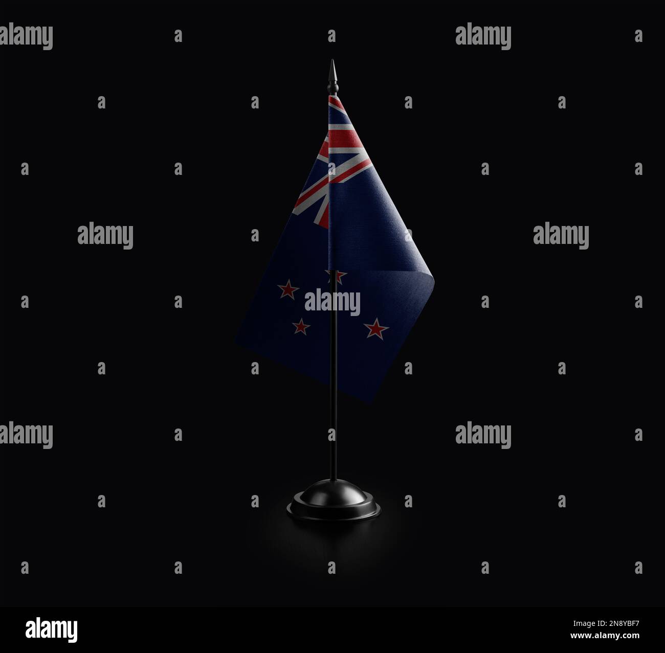 Small national flag of the New Zealand on a black background Stock ...