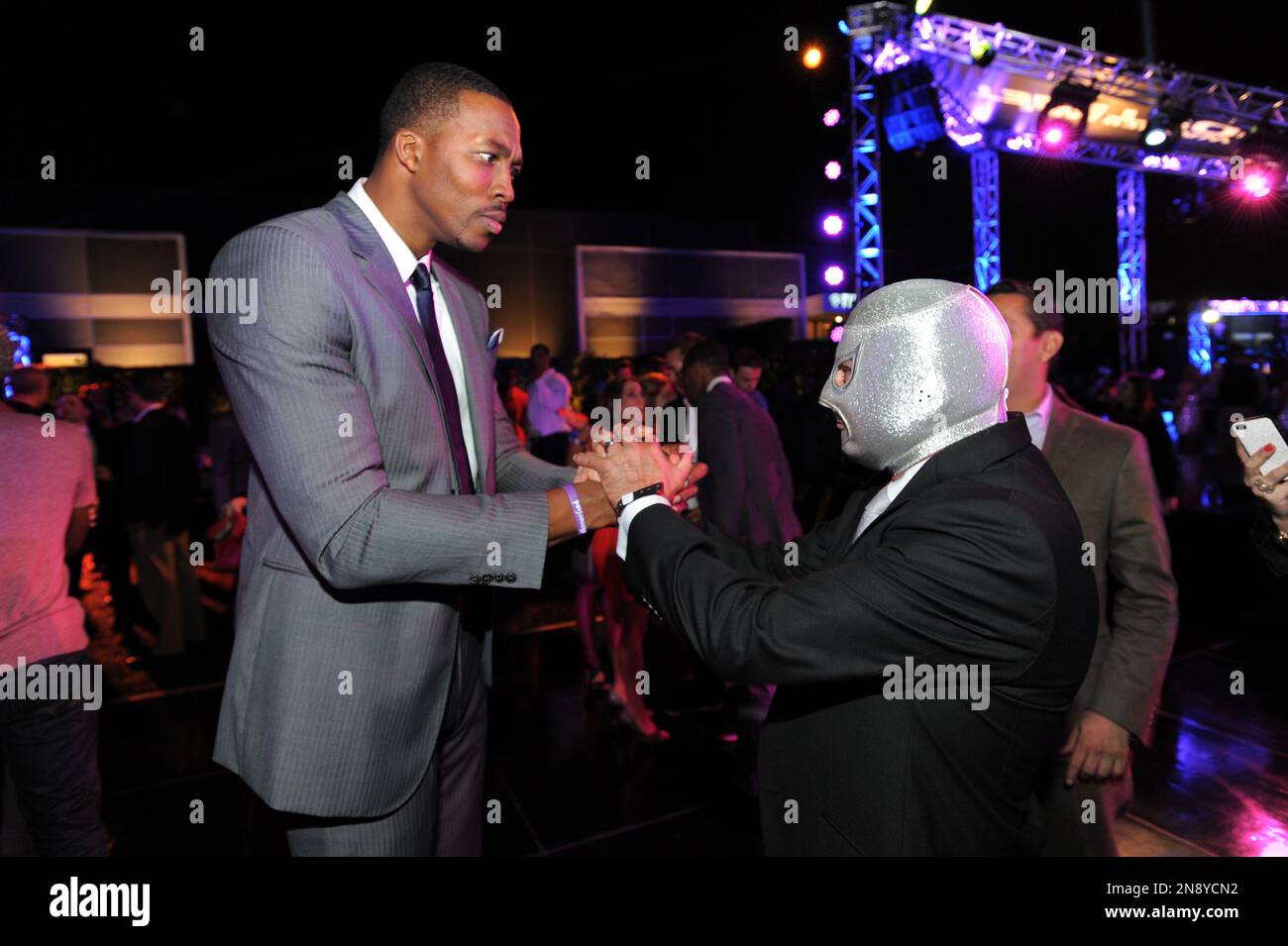 Dwight Howard, left, and El Hijo Del Santo attend the Time Warner Cable ...