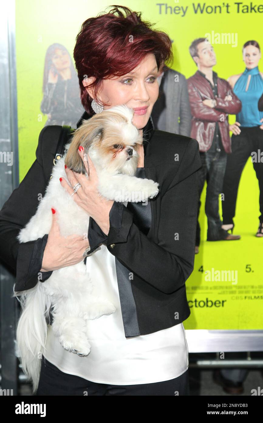 Sharon Osbourne poses with Bonny the dog at the premiere of "Seven ...
