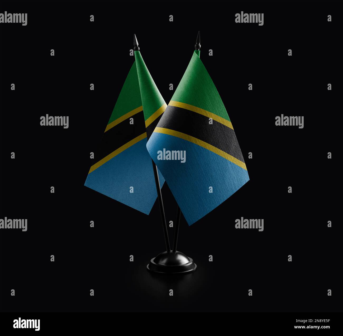 Small national flags of the Tanzania on a black background Stock Photo ...