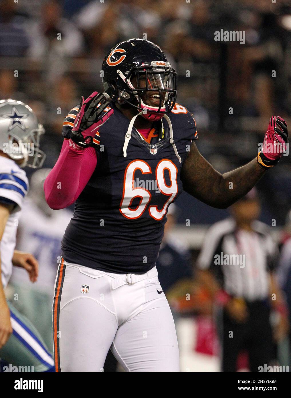 Chicago Bears' Henry Melton (69) celebrates after sacking Dallas ...