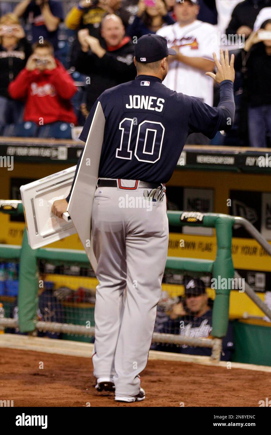 Atlanta Braves' Chipper Jones (10) walks to the dugout after a ceremony ...