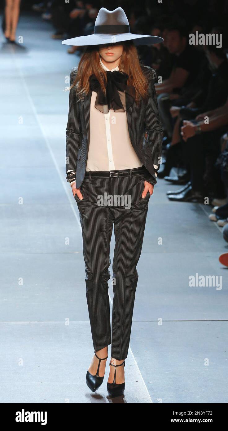 A model wears a creation by Born French fashion designer Hedi Slimane ...