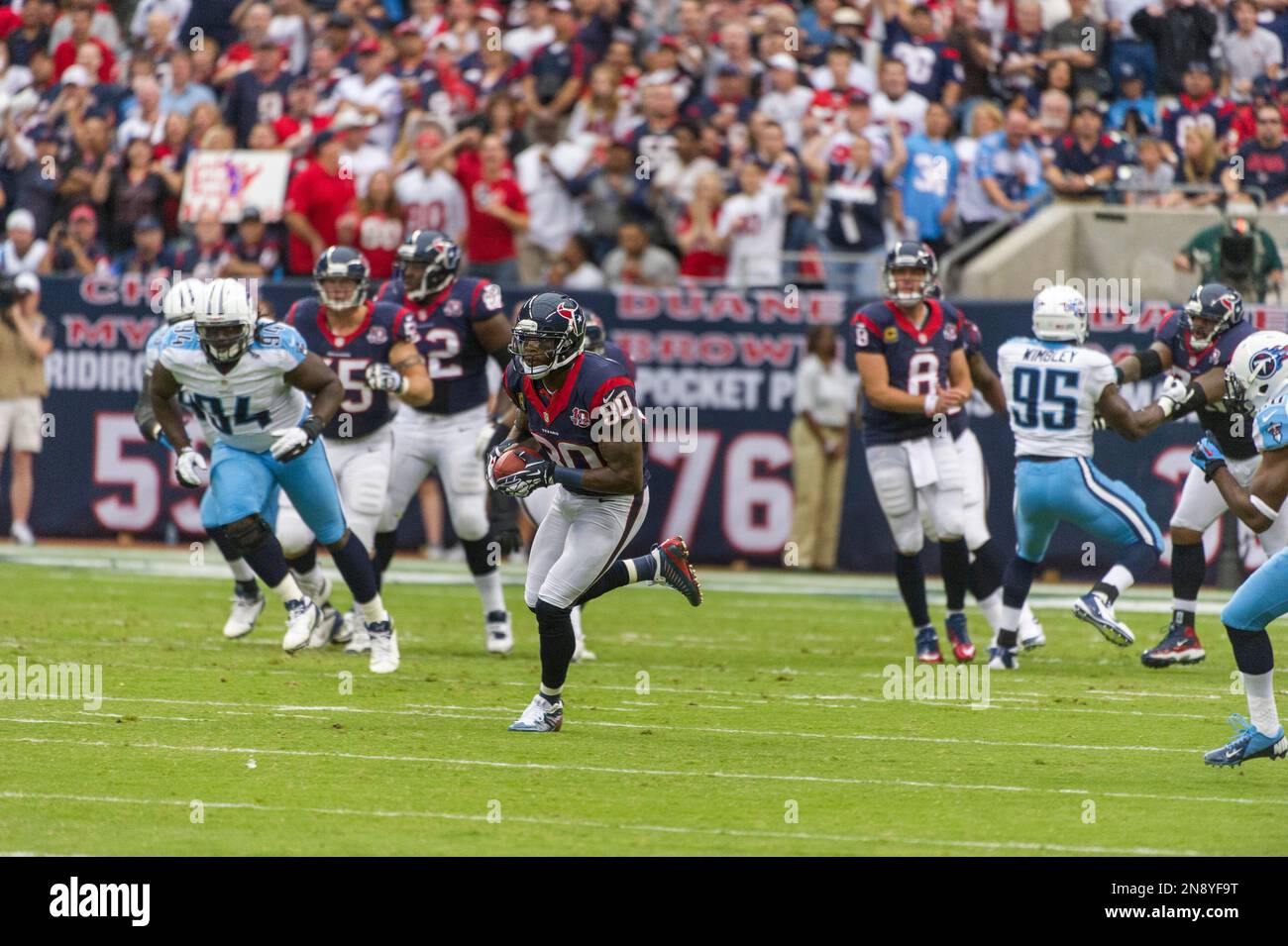 Houston Texans Andre Johnson (80) runs for a first down after a catch ...