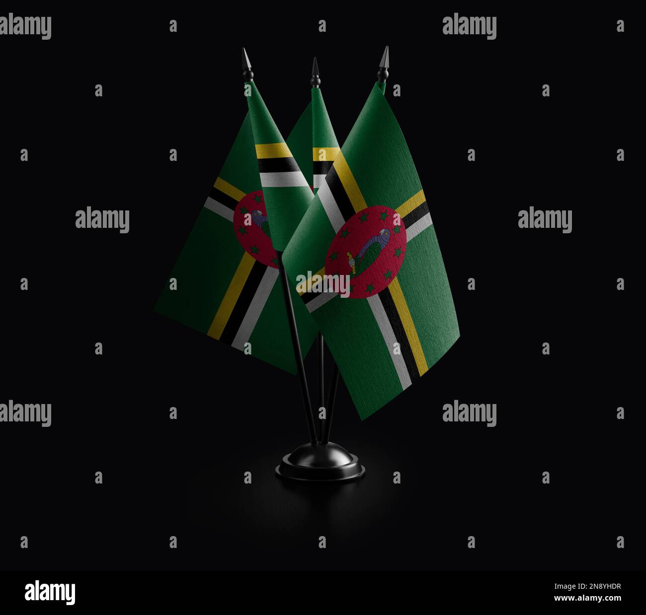 Small national flags of the Dominica on a black background Stock Photo ...