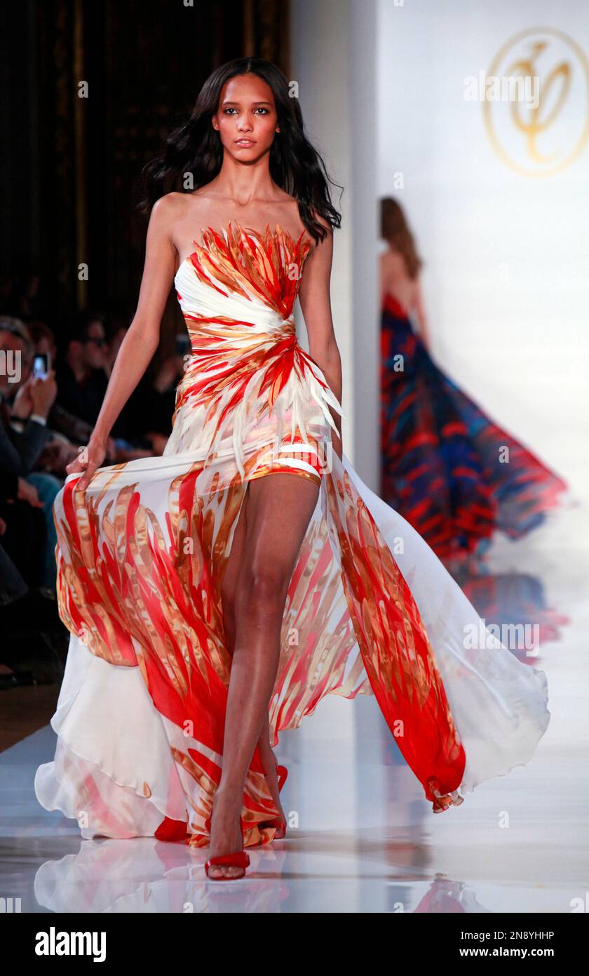 A model wears a creation for designer Valentin Yudashkin's ready to wear Spring-Summer 2013 ...