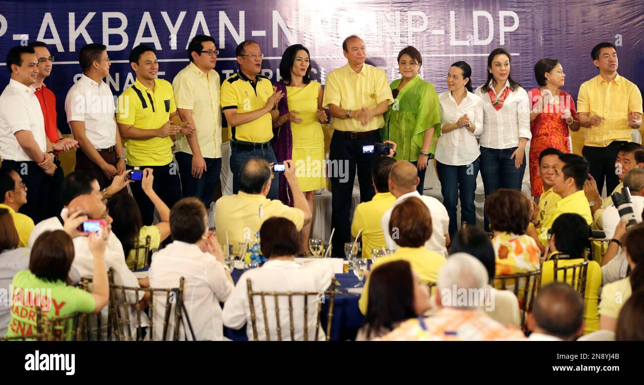 Philippine President Benigno Aquino III, sixth from left, endorses his ...