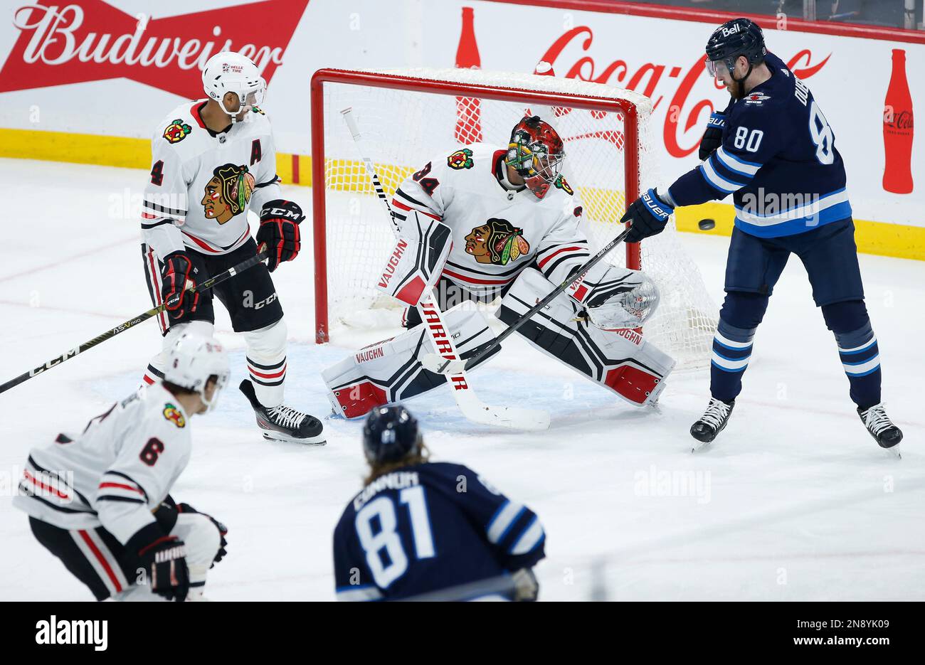 Winnipeg Jets' Pierre-Luc Dubois (80) tips the puck wide of Chicago ...