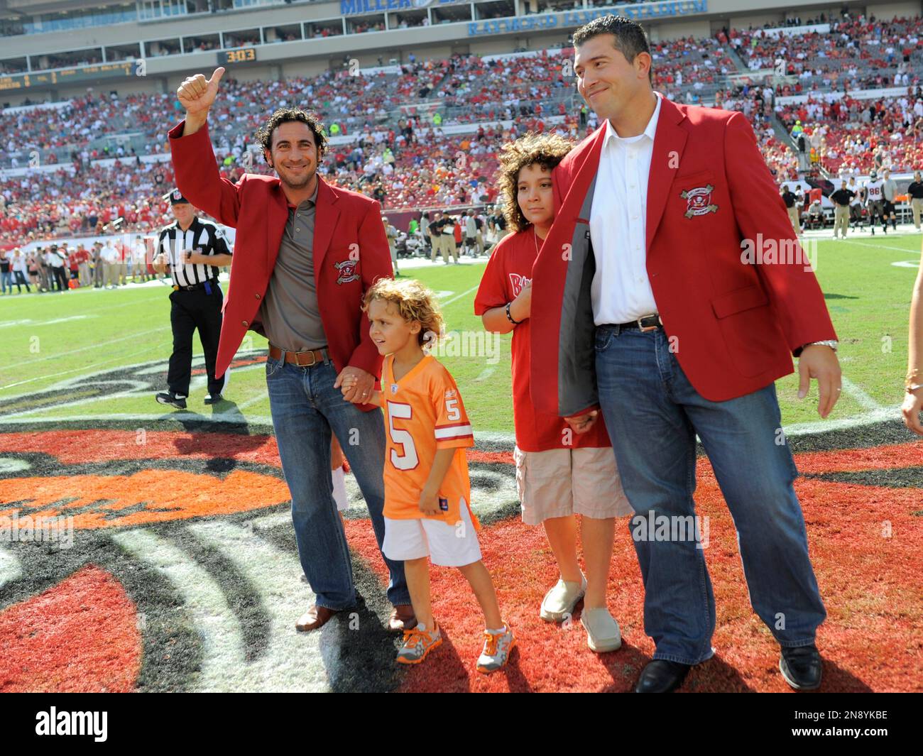 Former Tampa Bay Buccaneers kicker Martín Gramática, left, and former ...