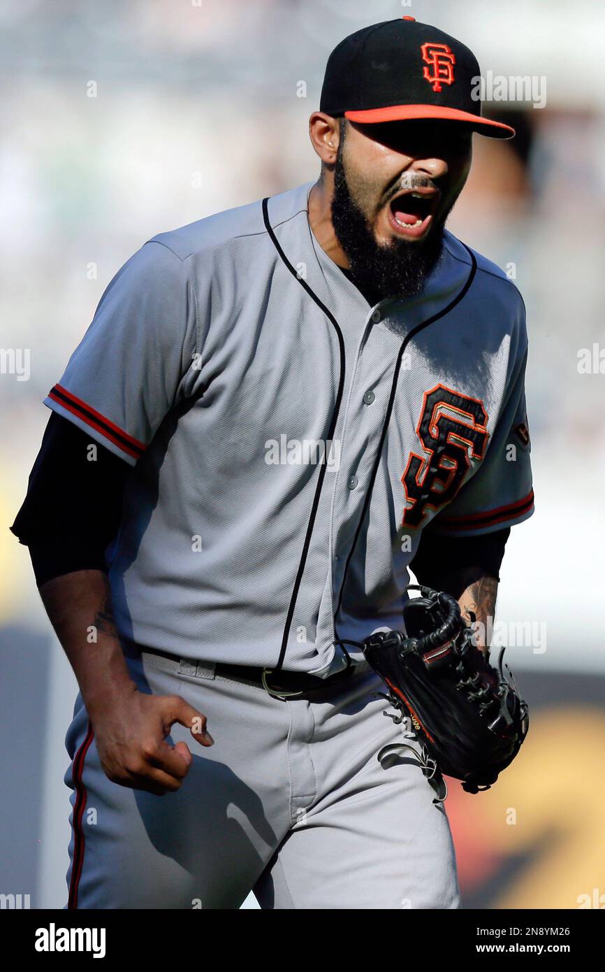 San Francisco Giants relief pitcher Sergio Romo reacts after getting ...